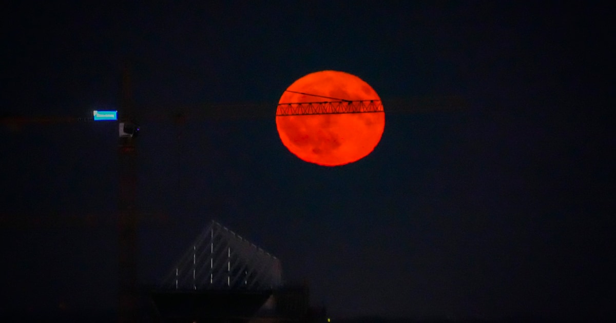 Rare ‘strawberry moon’: Bright red celestial body creates a spectacle ...